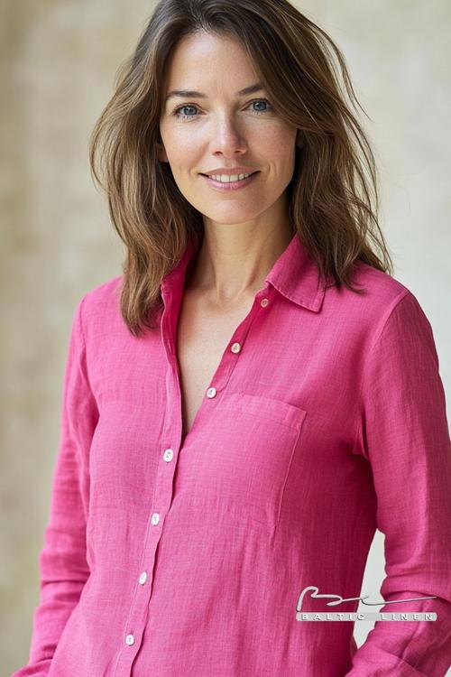 A bright pink linen shirt with long sleeves, buttoned up to the neck ...